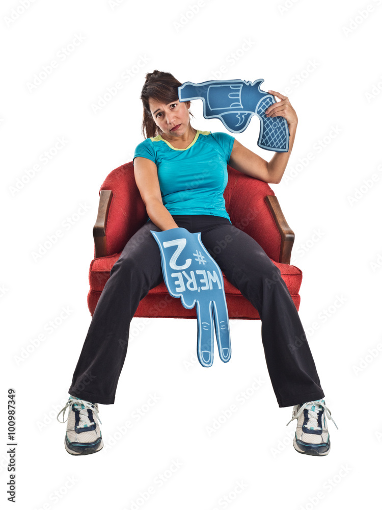 Humorous photograph of an adult female sports fan with a foam finger ...