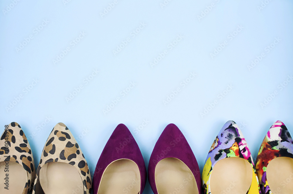 Stiletto shoes in different colours and patterns in straight line on ...