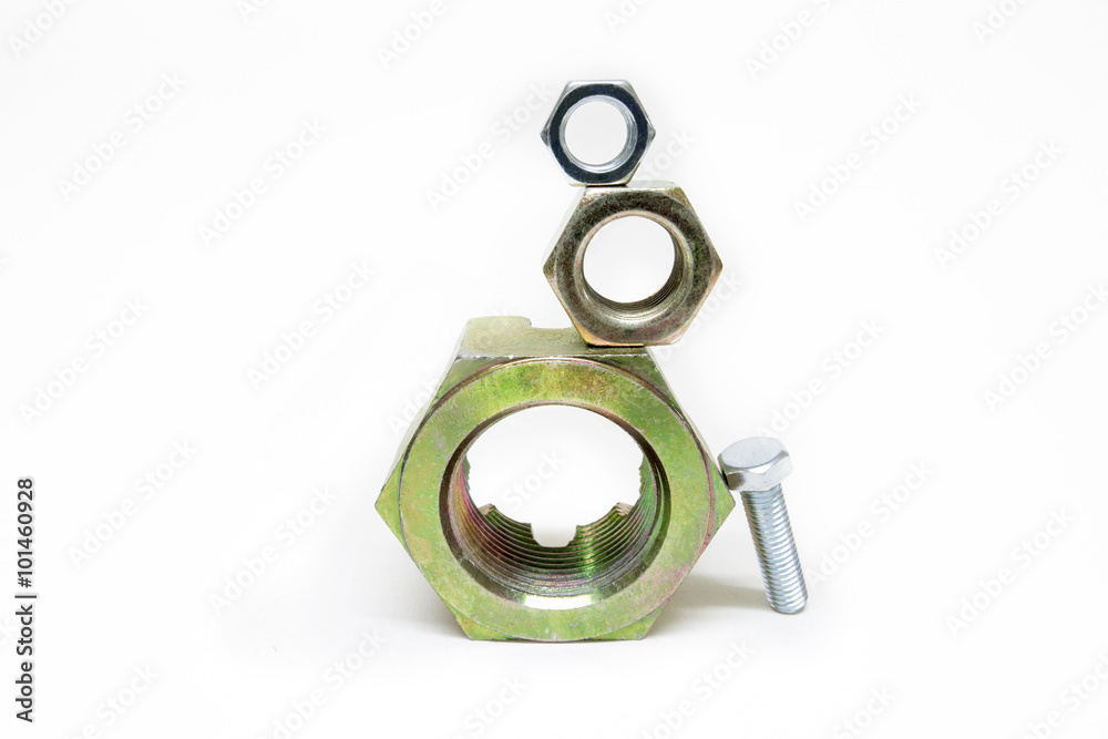 Three size nuts and a small bolt on white background, One size does not ...