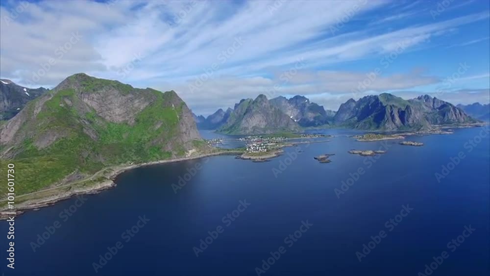 Aerial footage of beautiful town Reine in Norway on tiny islands ...