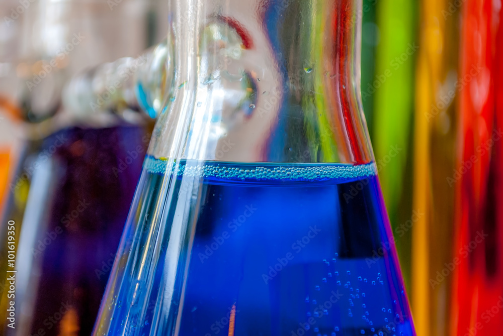 Such a nice color alignment with chemicals and chemistry glassware ...