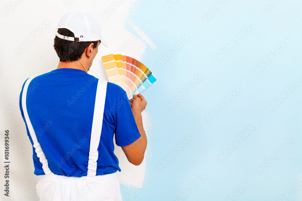 painter man looking a color palette Stock Photo | Adobe Stock