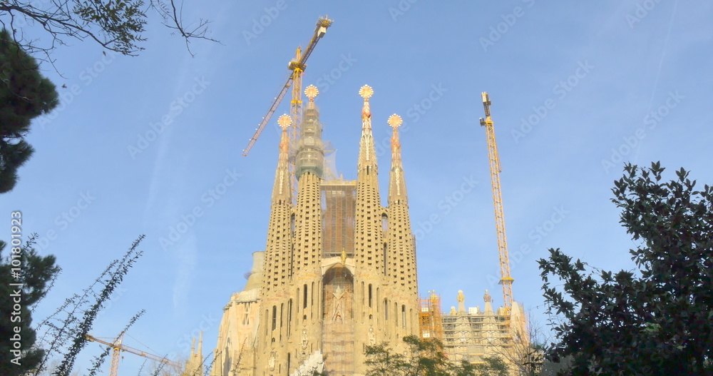 The Basílica i Temple Expiatori de la Sagrada Família is a large Roman ...