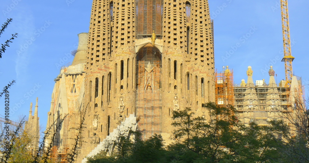 The Basílica i Temple Expiatori de la Sagrada Família is a large Roman ...