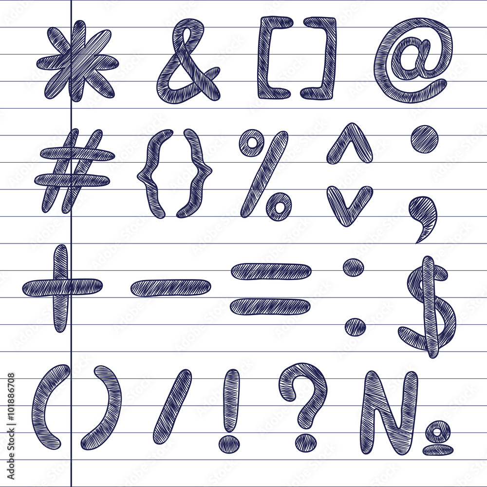 Symbols on notebook background. Commas, colons, exclamation mark ...