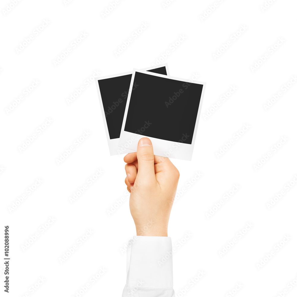 Hand holding blank photo frames mockup isolated. Empty old photo ...