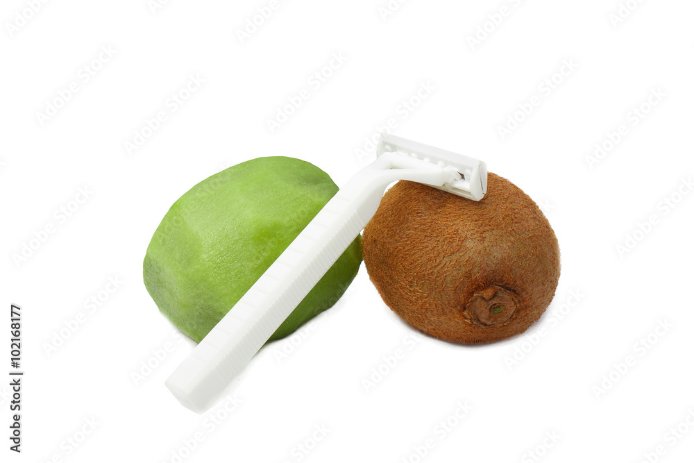 concept of remove unwanted hair. kiwi fruit and razor isolated on white ...