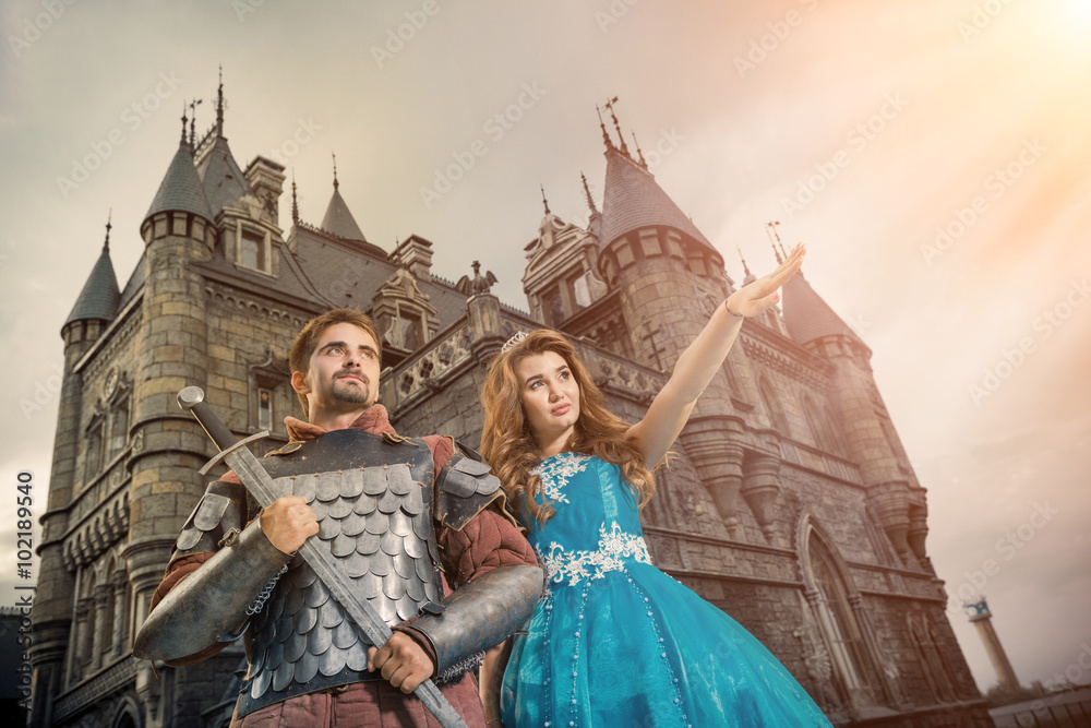 Beautiful princess is showing something to her brave knight Stock Photo ...