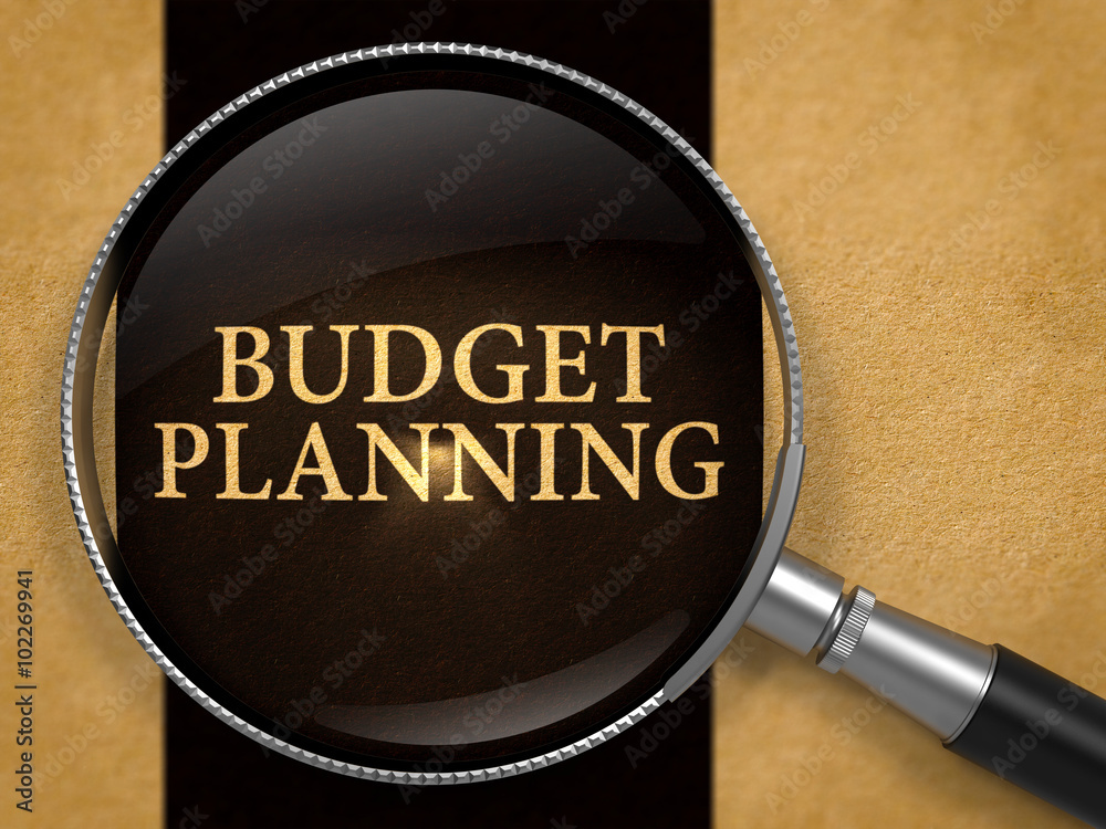 Budget Planning Concept through Magnifier on Old Paper with Black ...