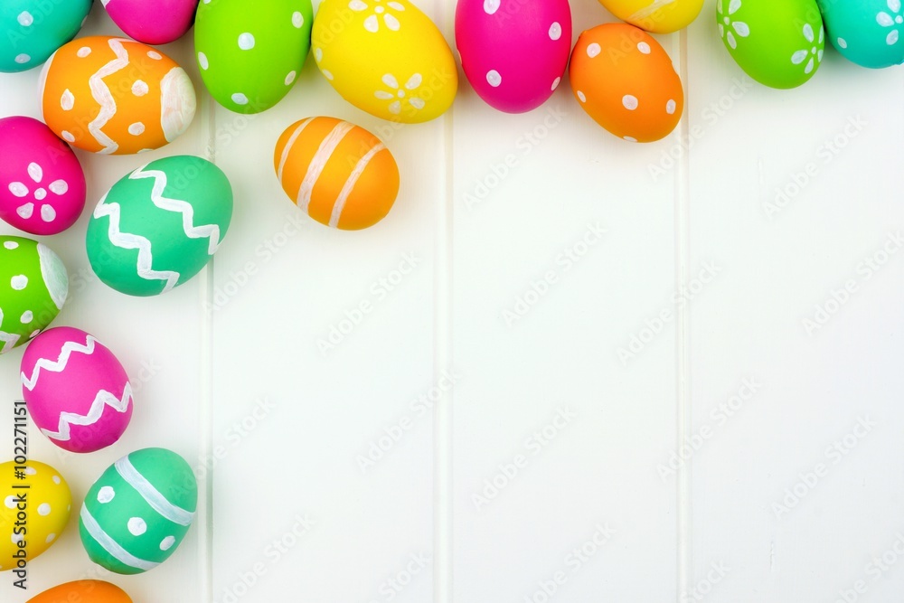 Colorful Easter egg corner border against a white wood background Stock ...