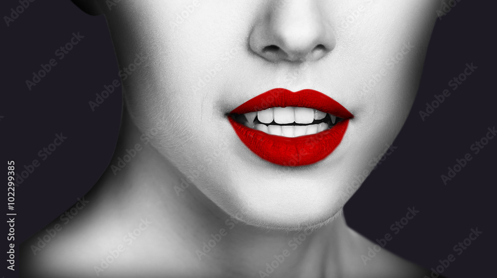 Sexy vampire woman with red lips. Stock Photo | Adobe Stock