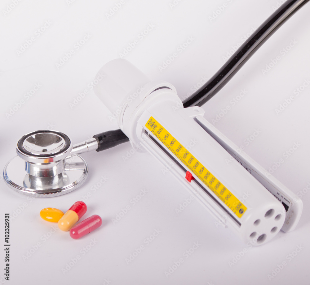 Asthma inhaler, peak flow meter, drugs and stethoscope Stock Photo ...