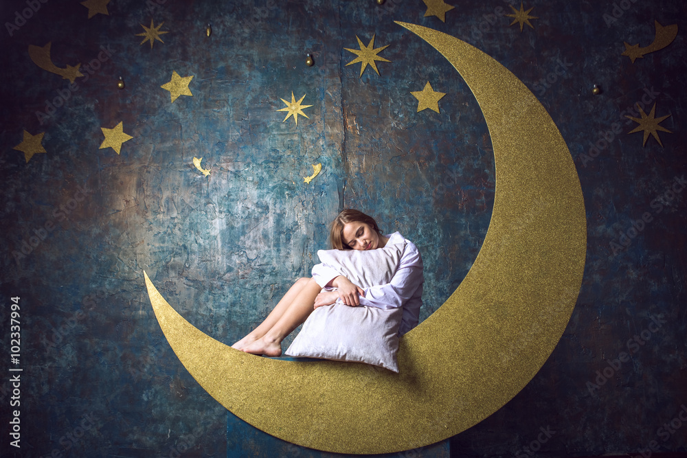 girl sleeping on the moon Stock Photo | Adobe Stock