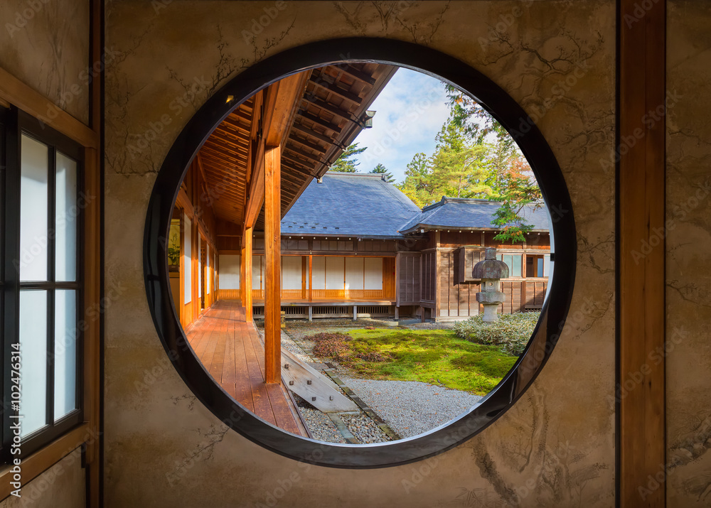 View of a JApanese Garden Through a round window Stock Photo | Adobe Stock