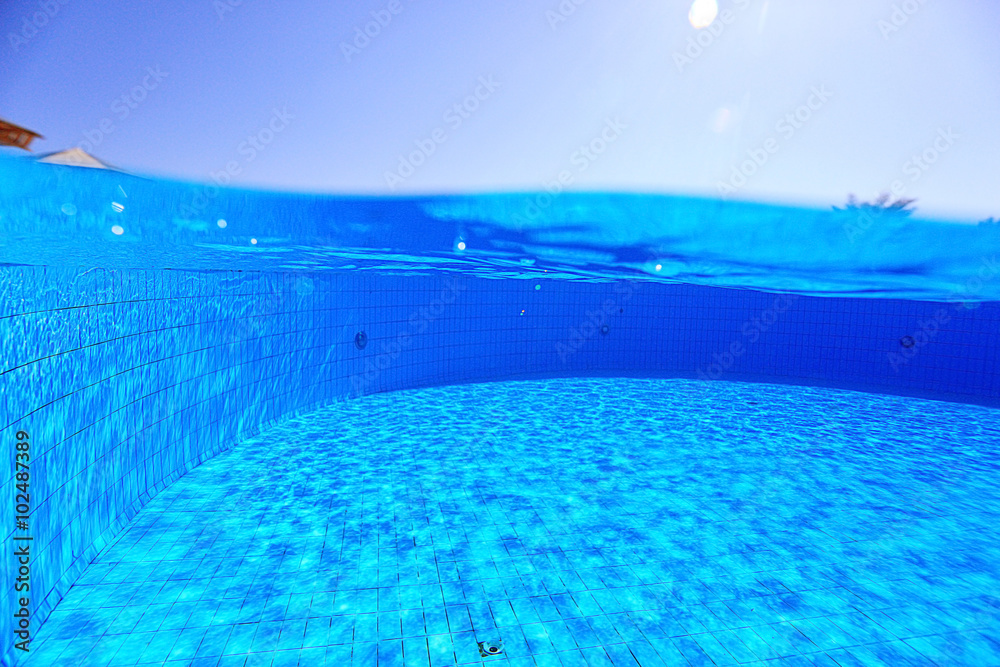 underwater in a swimming pool Stock Photo | Adobe Stock