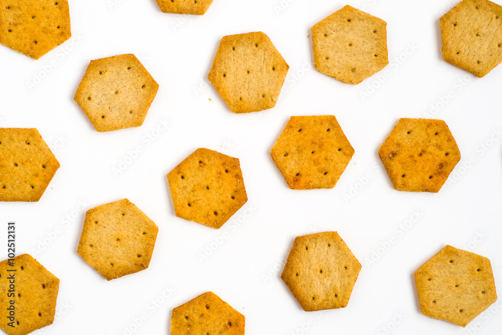 Yellow, hexagon crackers isolated on white background. Food texture ...