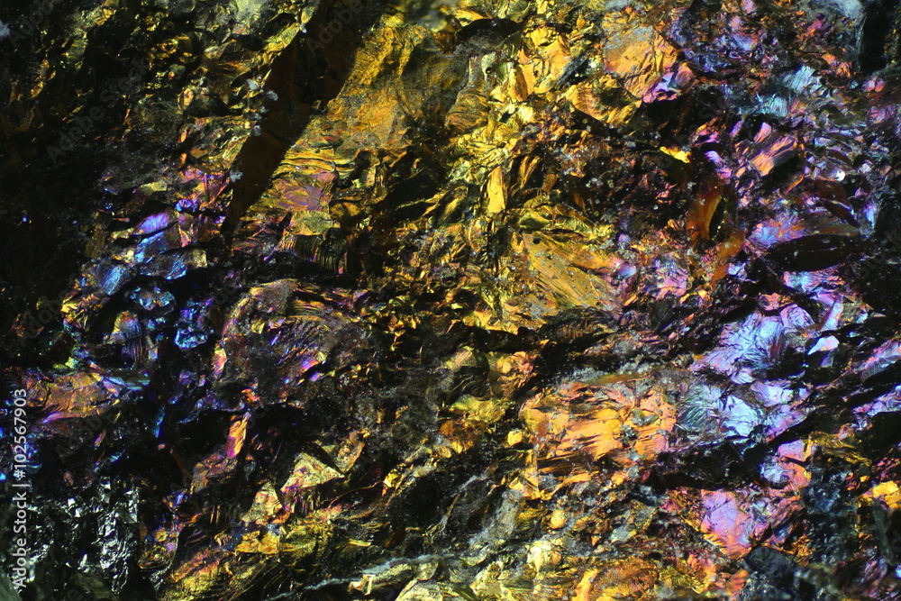 Microscope image of colorful copper ore. This is copper sulphide called ...