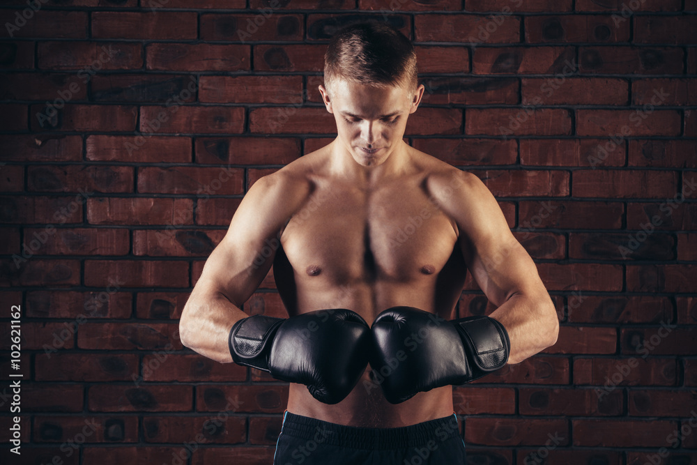 portrait of mma fighter in boxing pose against brick wall Stock Photo ...