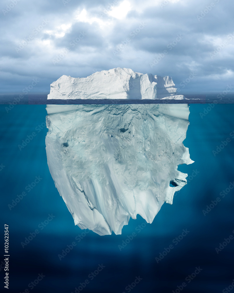 Mostly Underwater Iceberg Floating in Ocean Stock Photo | Adobe Stock