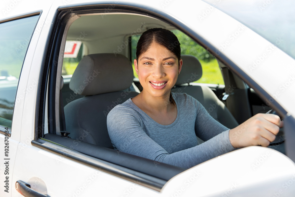 female learner driver looking out of the car window Stock Photo | Adobe ...