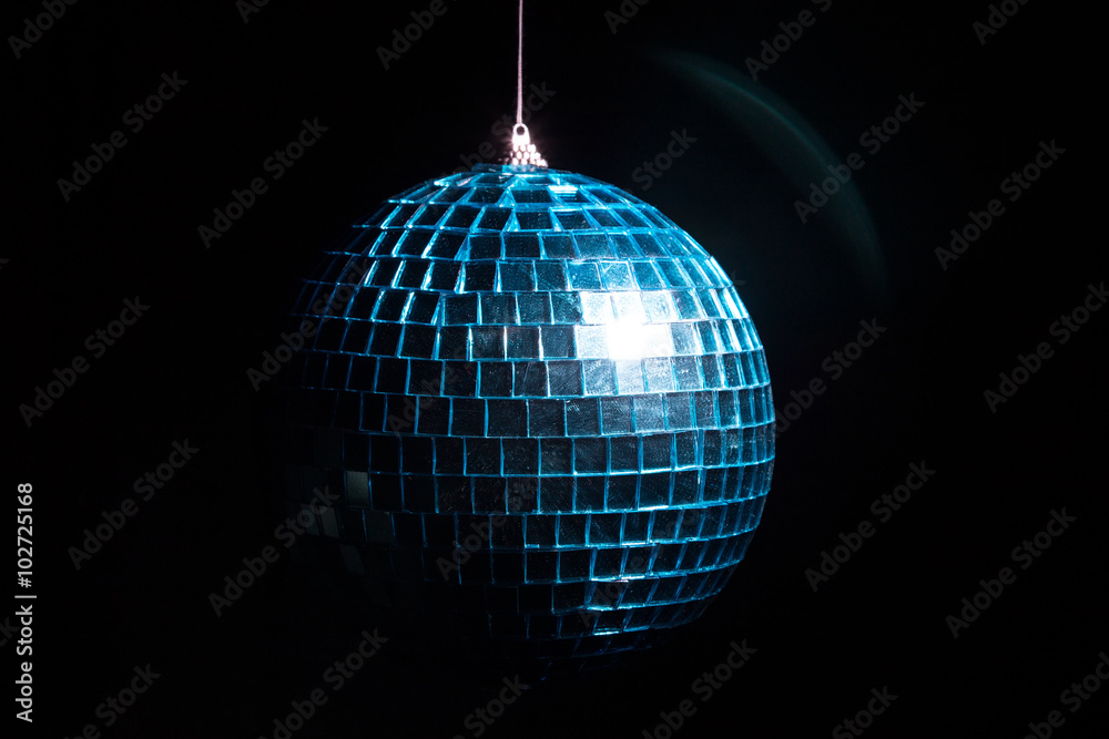 Blue disco ball in shadow Stock Photo | Adobe Stock
