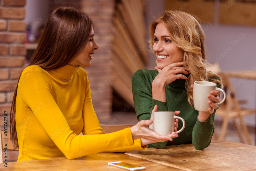 Beautiful girls in cafe Stock Photo | Adobe Stock