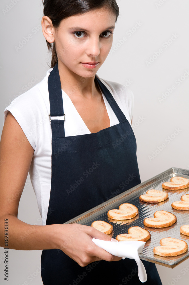Woman cooking some cookies Stock Photo | Adobe Stock