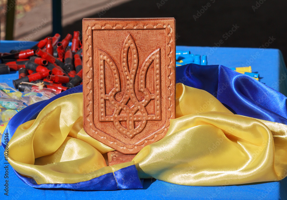 Ukrainian flag, coat of arms and machine-gun shells painted in p Stock ...