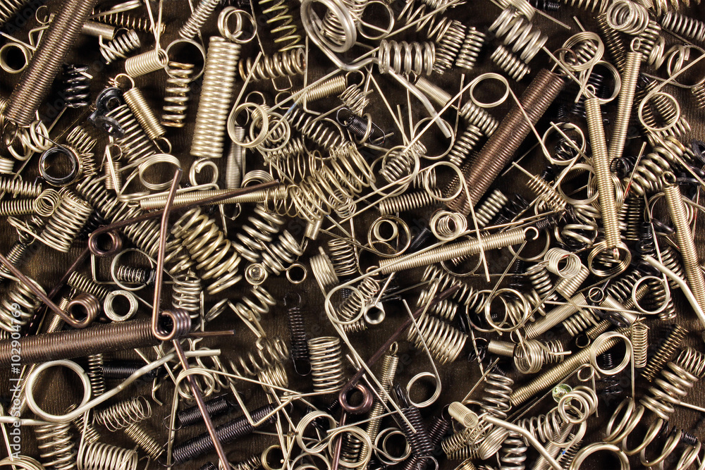 Many small metal springs as a background Stock Photo | Adobe Stock