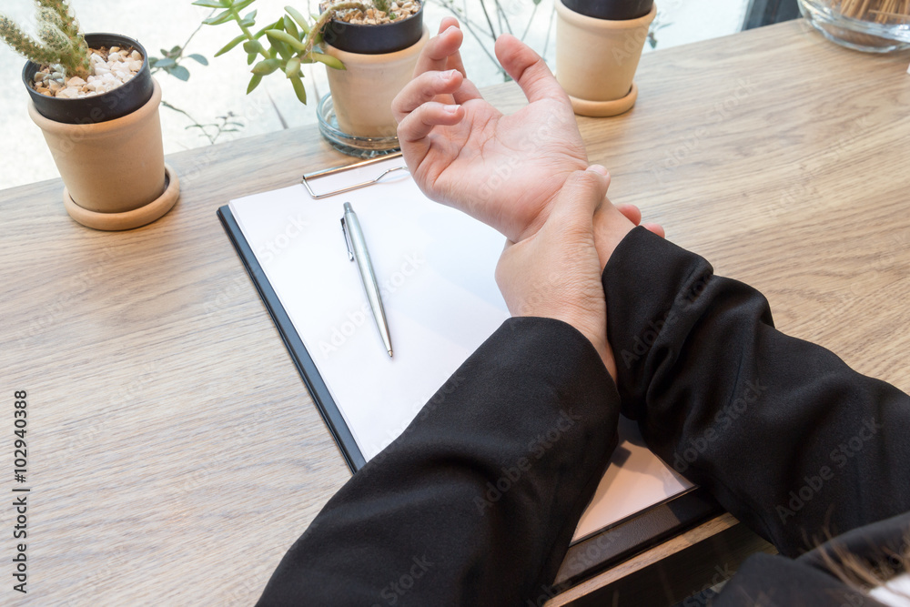Woman hand pain on desk - office syndrome Stock Photo | Adobe Stock