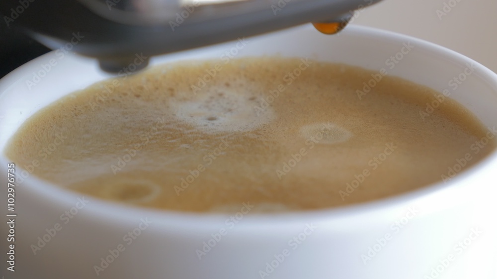 Vidéo Stock Coffee dripping in ceramic espresso cup 4K 3840X2160 UHD ...