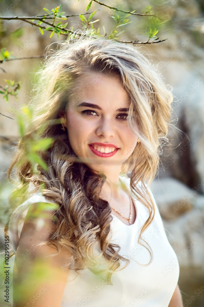 Beautiful model posing in the bosom of green nature Stock Photo | Adobe ...