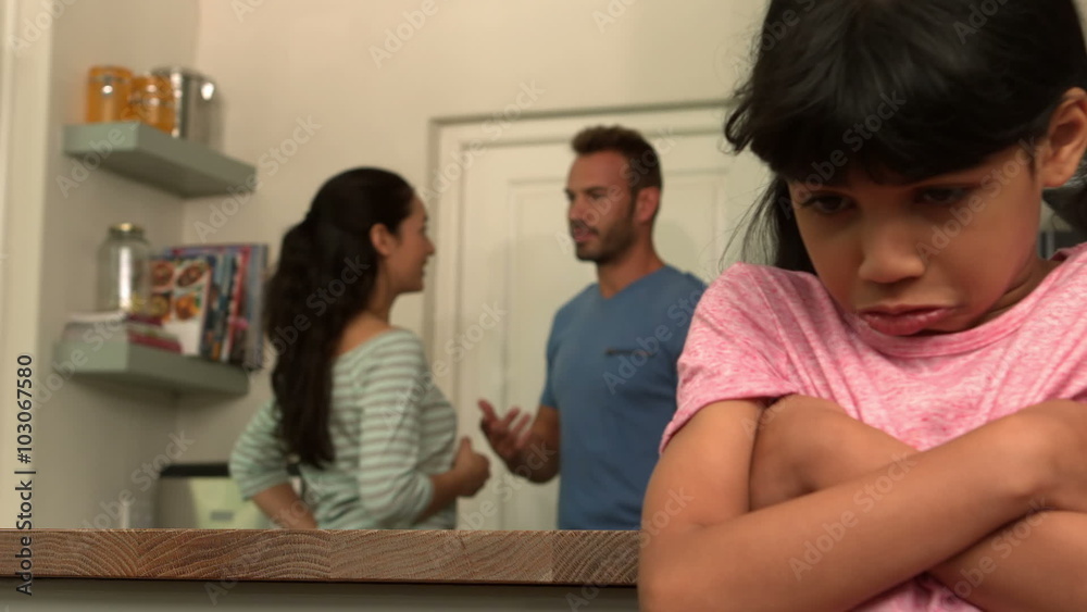 Sad girl listening her parents arguing Stock Video | Adobe Stock