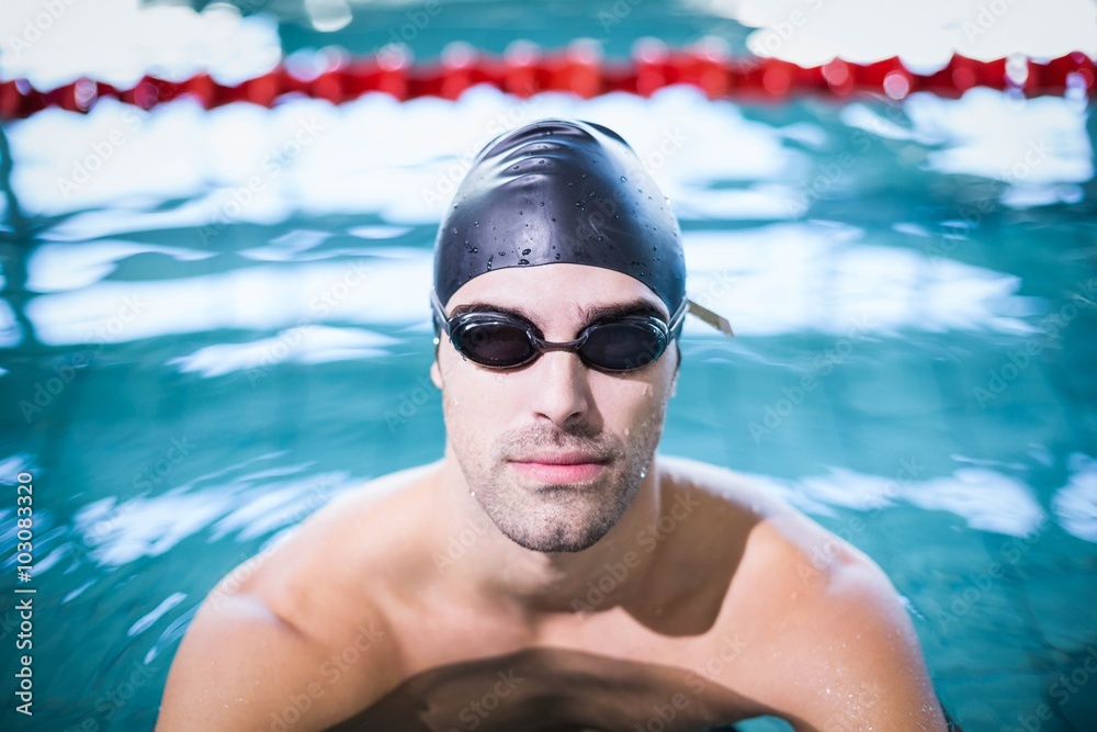 Man wearing swimming goggles Stock Photo | Adobe Stock