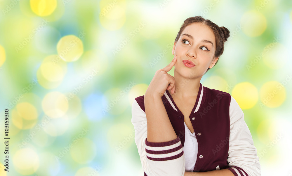 happy pretty teenage girl thinking Stock Photo | Adobe Stock