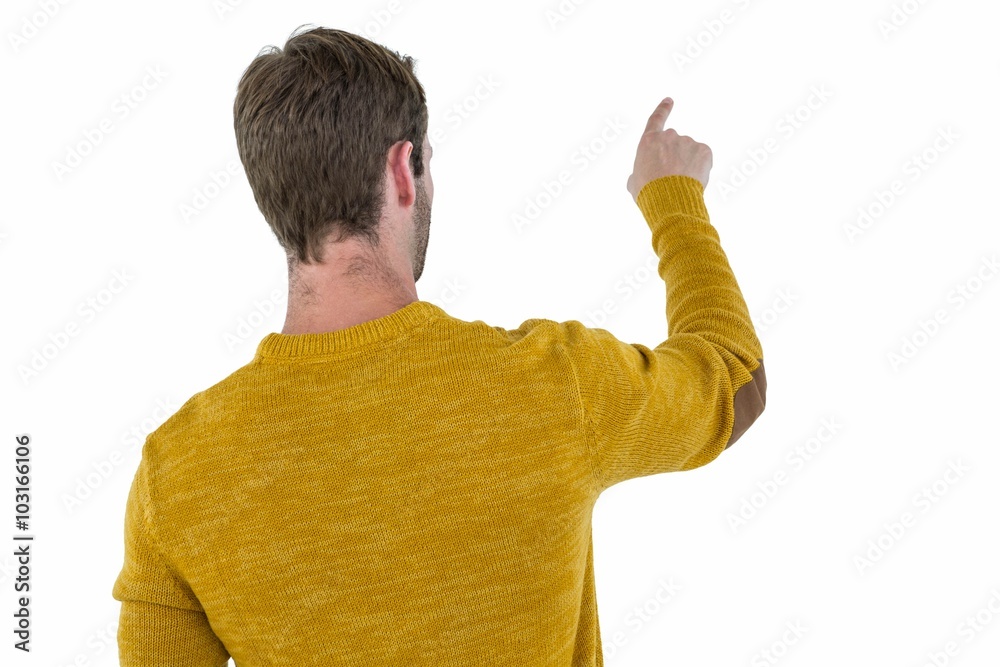 Hipster man pointing at something Stock Photo | Adobe Stock
