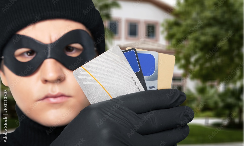 Thief. Stock Photo | Adobe Stock