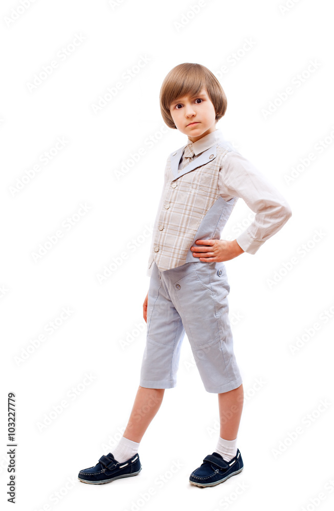 Young boy in light blue suit with waistcoat, isolated on white ...
