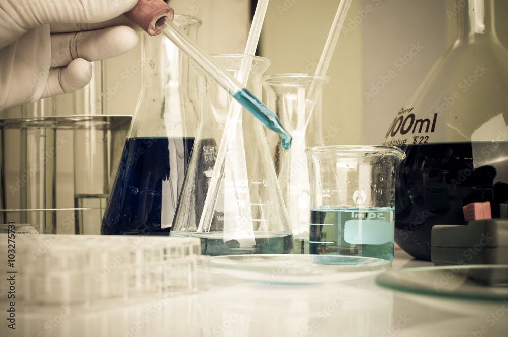 science laboratory test tubes with periodic table background Stock ...