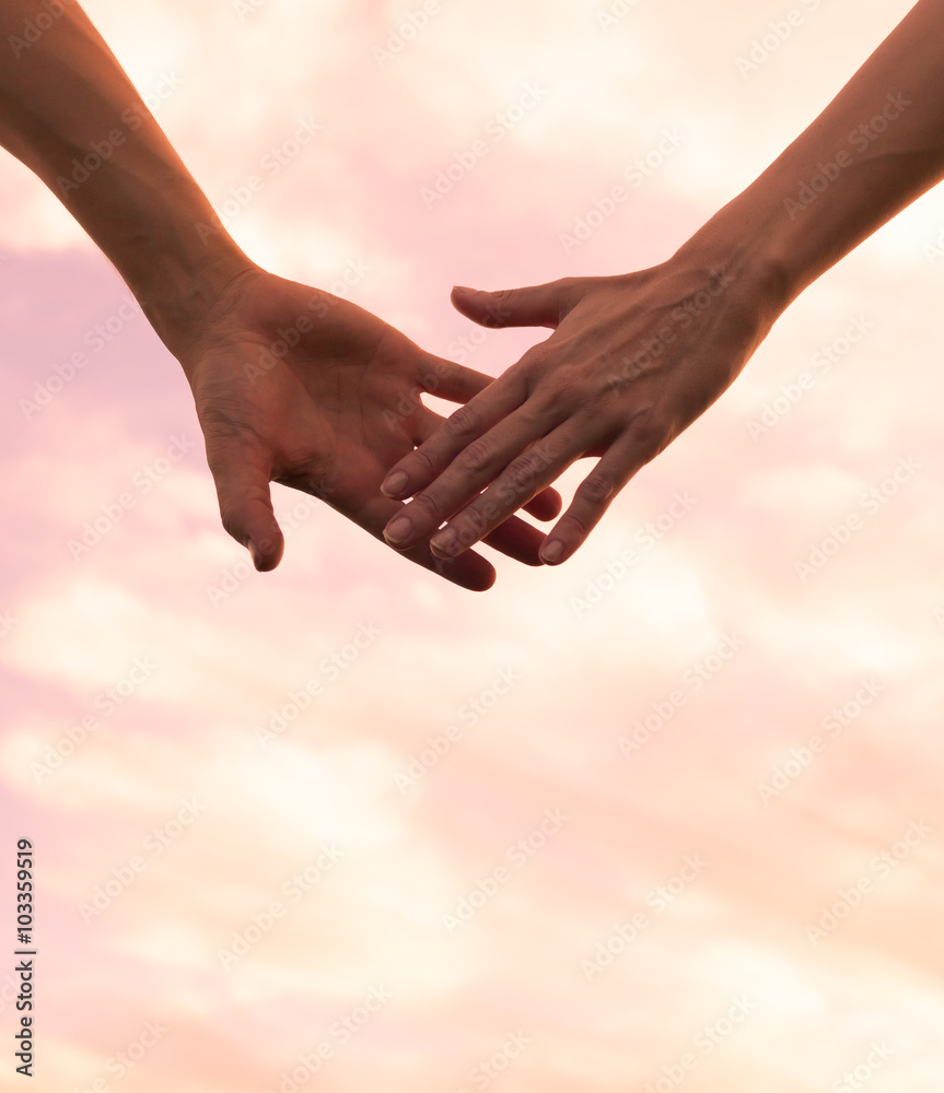 Two hands coming together. Stock Photo | Adobe Stock