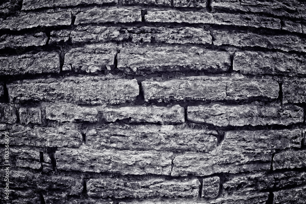 Old brick, stone wall. Black and white image in depression, anger ...