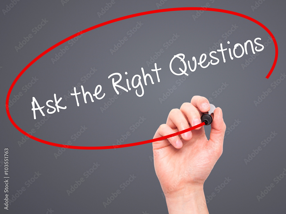 Man Hand writing Ask the Right Questions with black marker on vi Stock ...