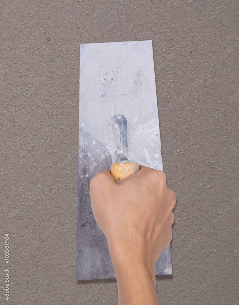 hand of worker use trowel plastering concrete at wall Stock Photo ...