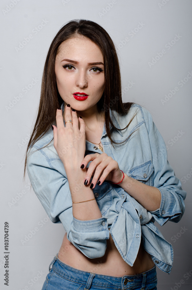 girl in denim outfit Stock Photo | Adobe Stock