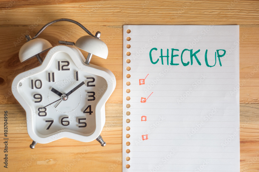 Health check up period concept, top view clock and paper note on wood ...