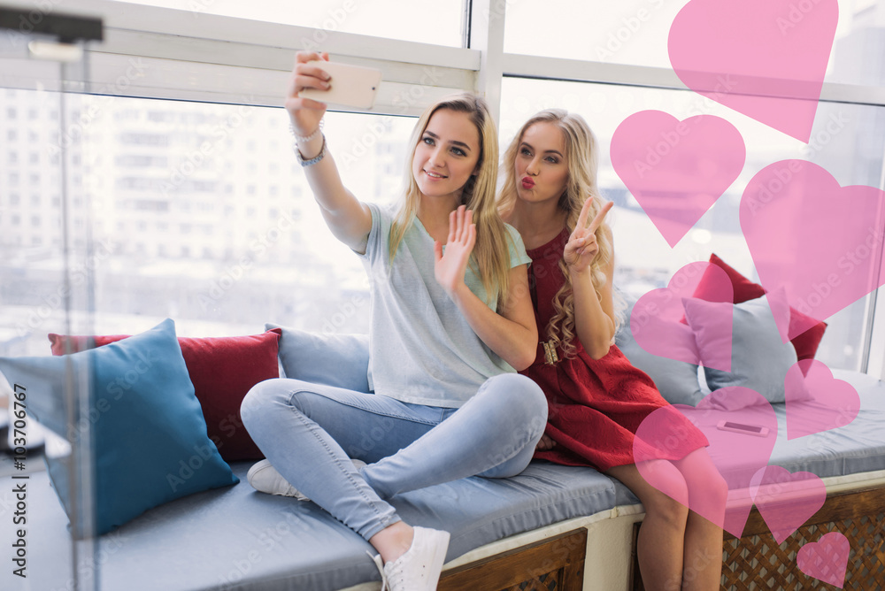 two girls are broadcast in the periscope and get a lot of likes Stock ...