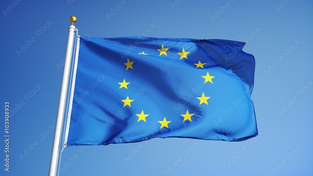 European Union flag waving in slow motion against blue sky, seamlessly ...