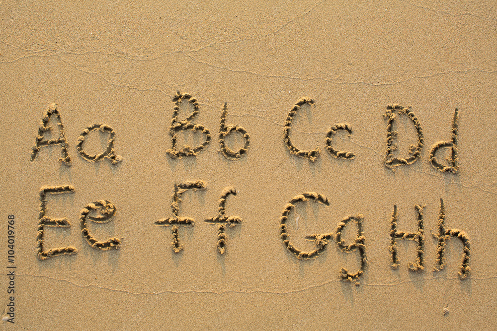 Alphabet written in light beach sand, part 1 of 4 (A-H) Stock Photo ...