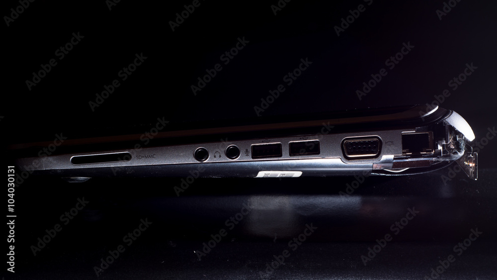 Laptop with broken outer casing wide. A computer with damage to shell ...