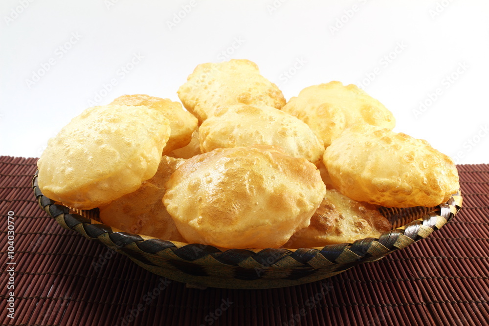 puri or Poori traditional indian homemade deep fried bread or chapati ...